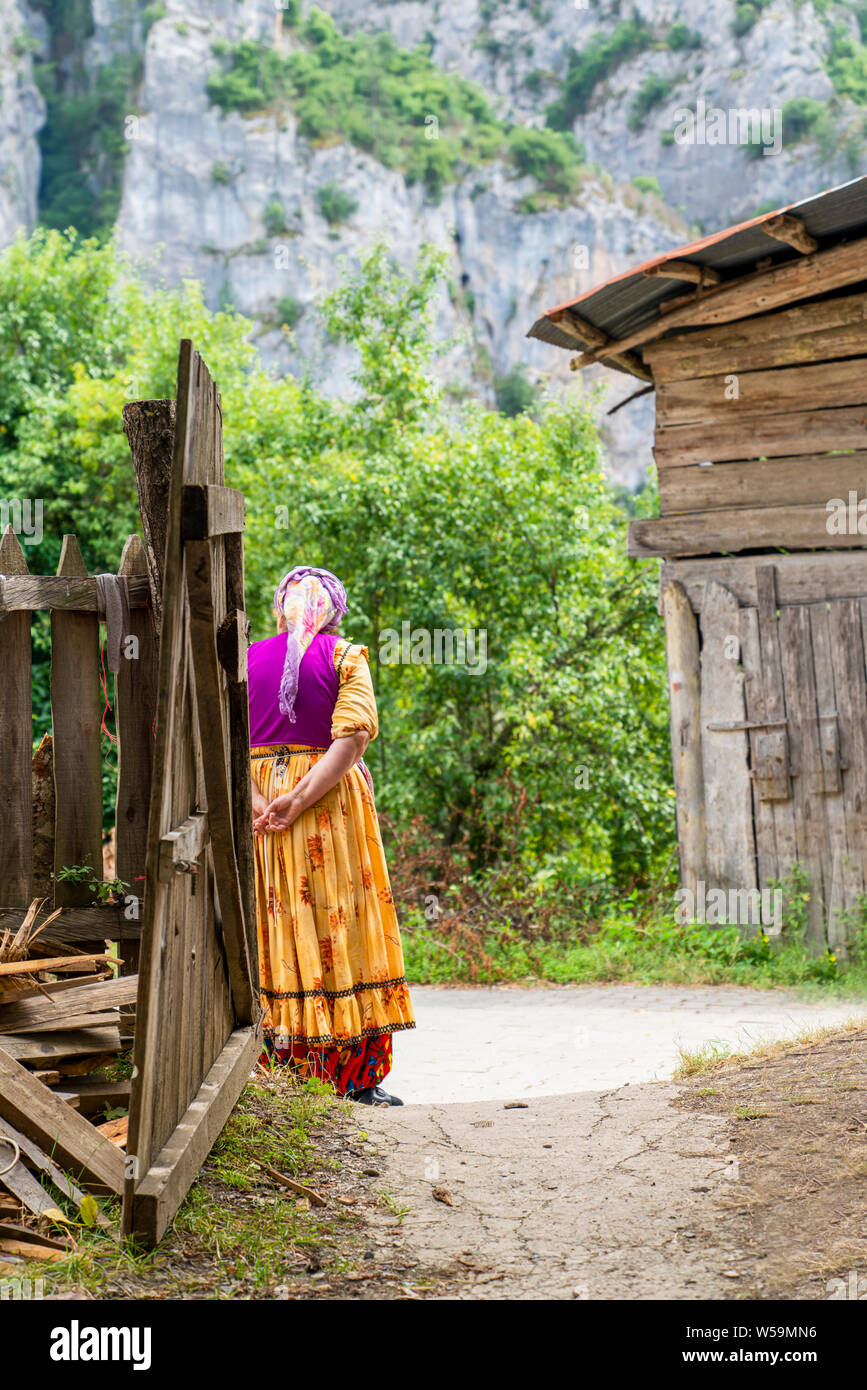 Turkish woman in traditional colorful clothes in Pinarbasi, Kastamonu ...
