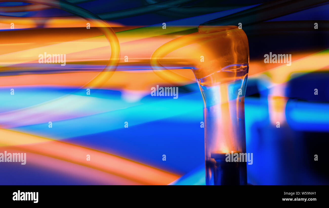 Creative orange color neon light abstraction Stock Photo - Alamy