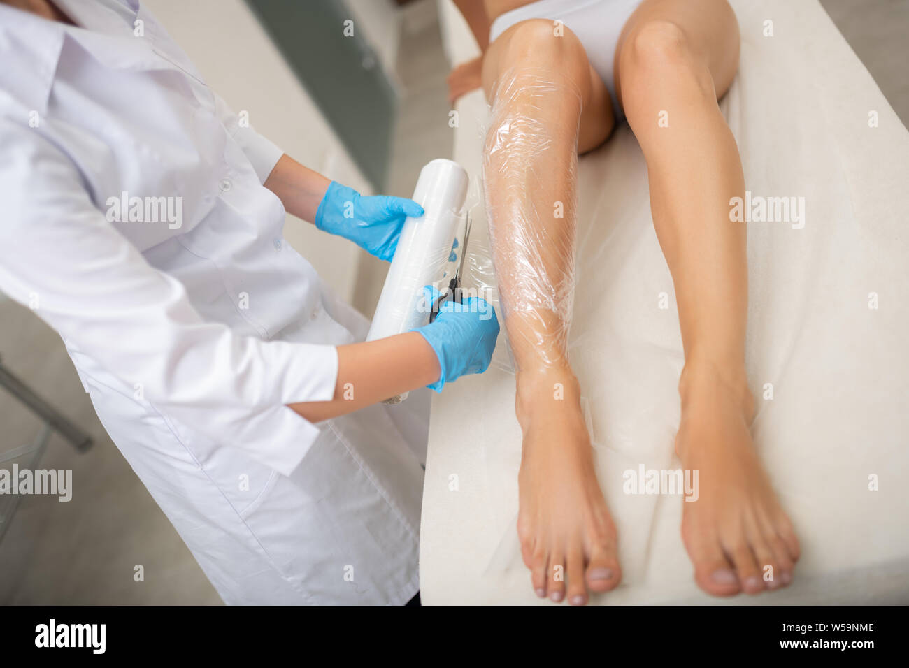 Plastic wrap body hi-res stock photography and images - Alamy