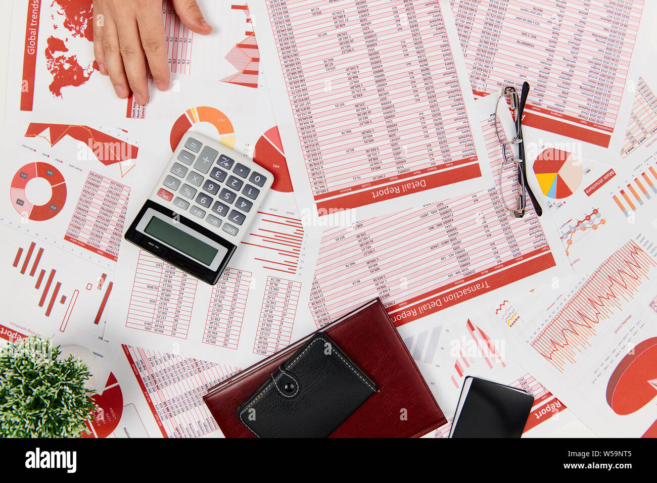Flat top view of businessman working and calculating finance, reads and ...