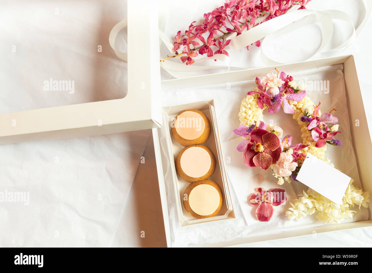 French profiteroles in gift box with flower for ocation Stock Photo - Alamy