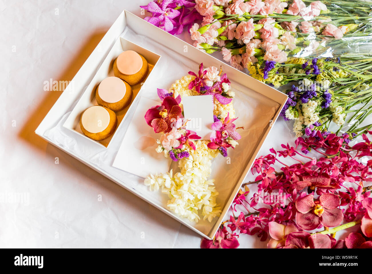 French profiteroles in gift box with flower for ocation Stock Photo - Alamy