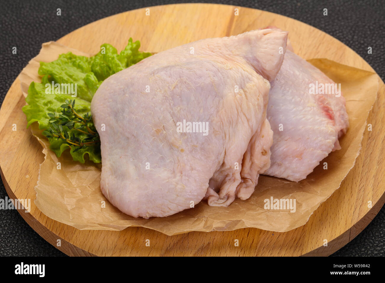 Raw chicken hip ready for cooking Stock Photo - Alamy