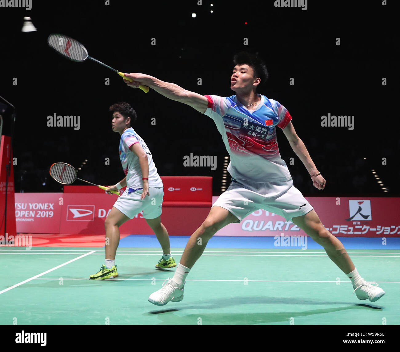 Tokyo. 27th July, 2019. Wang Yilyu (R)/Huang Dongping of China compete ...