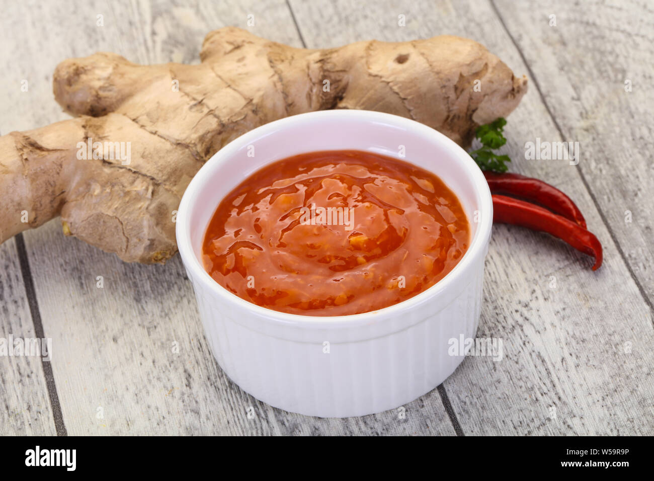 Ginger chili sauce with root and pepper Stock Photo - Alamy