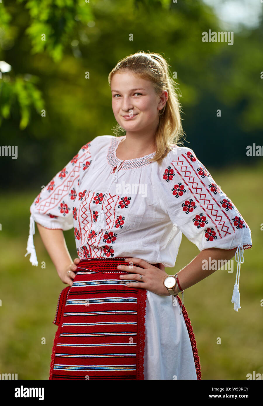 Portrait of a Romanian girl in traditional costume in an oak forest Stock Photo - Alamy