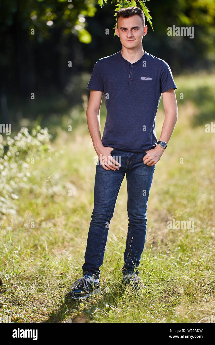 Closeup portrait of a handsome young man outdoor Stock Photo - Alamy