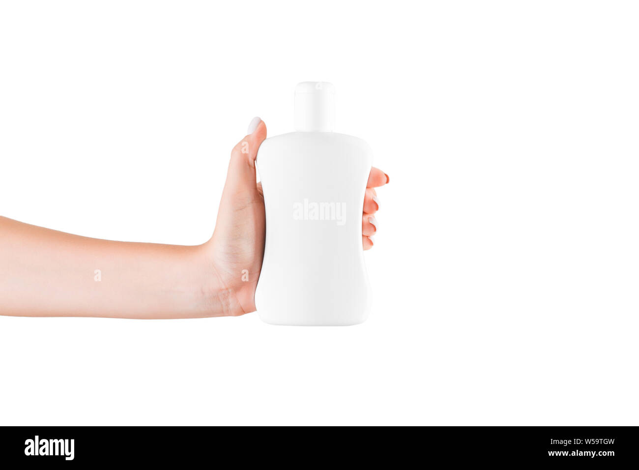 Female hand holding cream bottle of lotion isolated. Girl give cosmetic ...