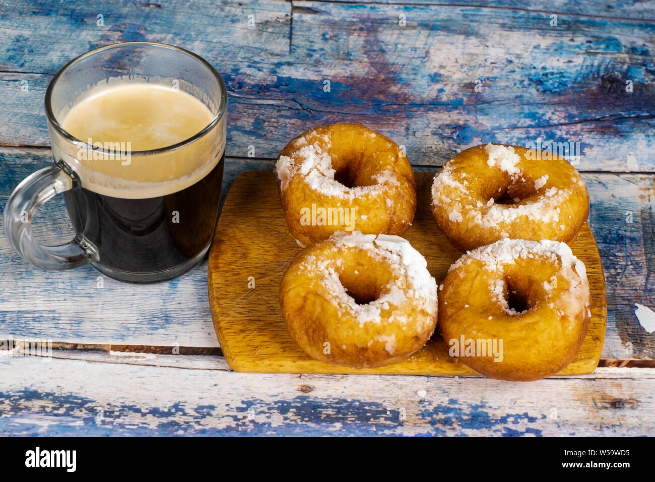 Fresh donuts with powdered sugar Stock Photo - Alamy