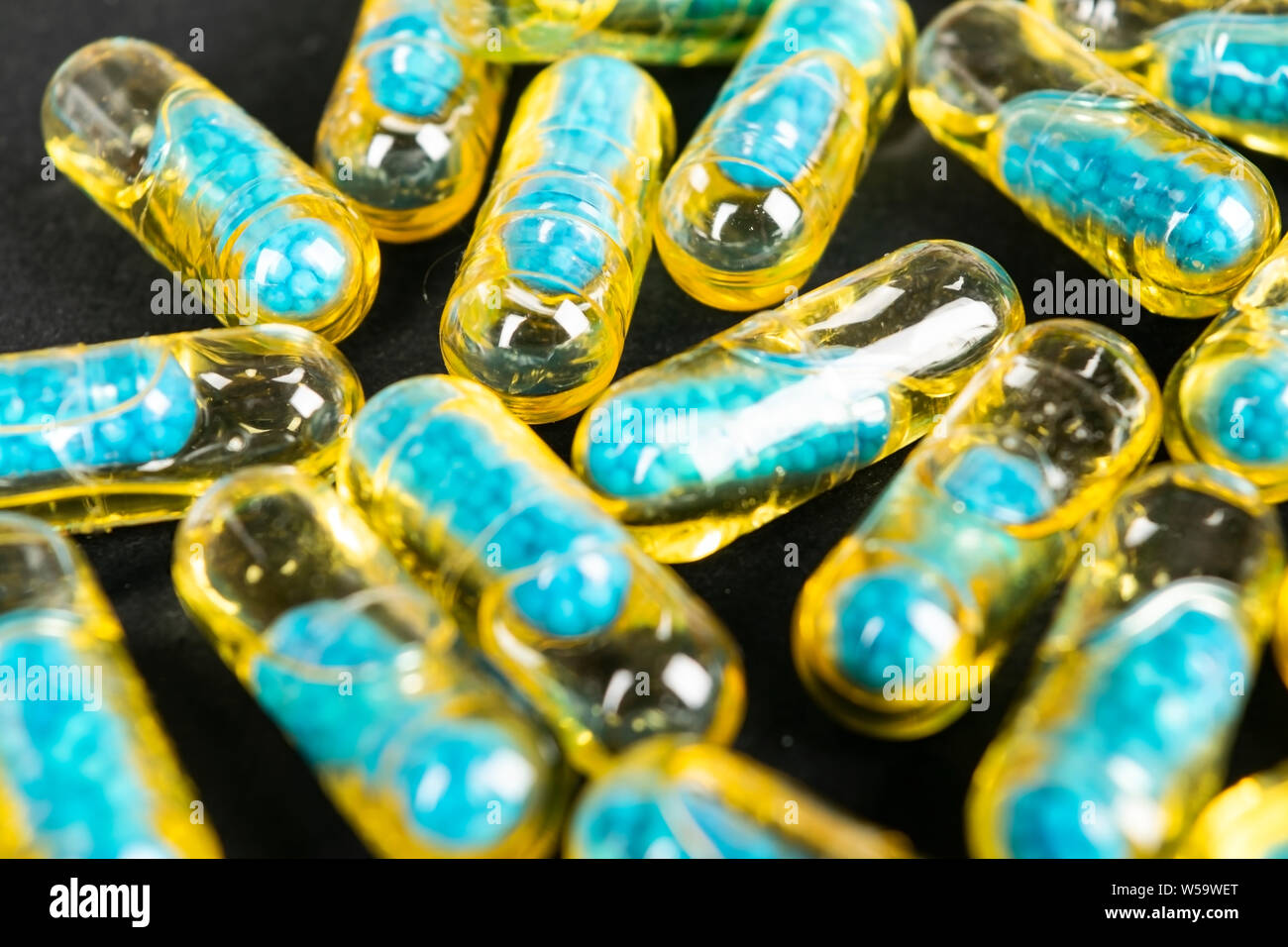 Tablets scattered on table pharmaceutical hi-res stock photography and ...