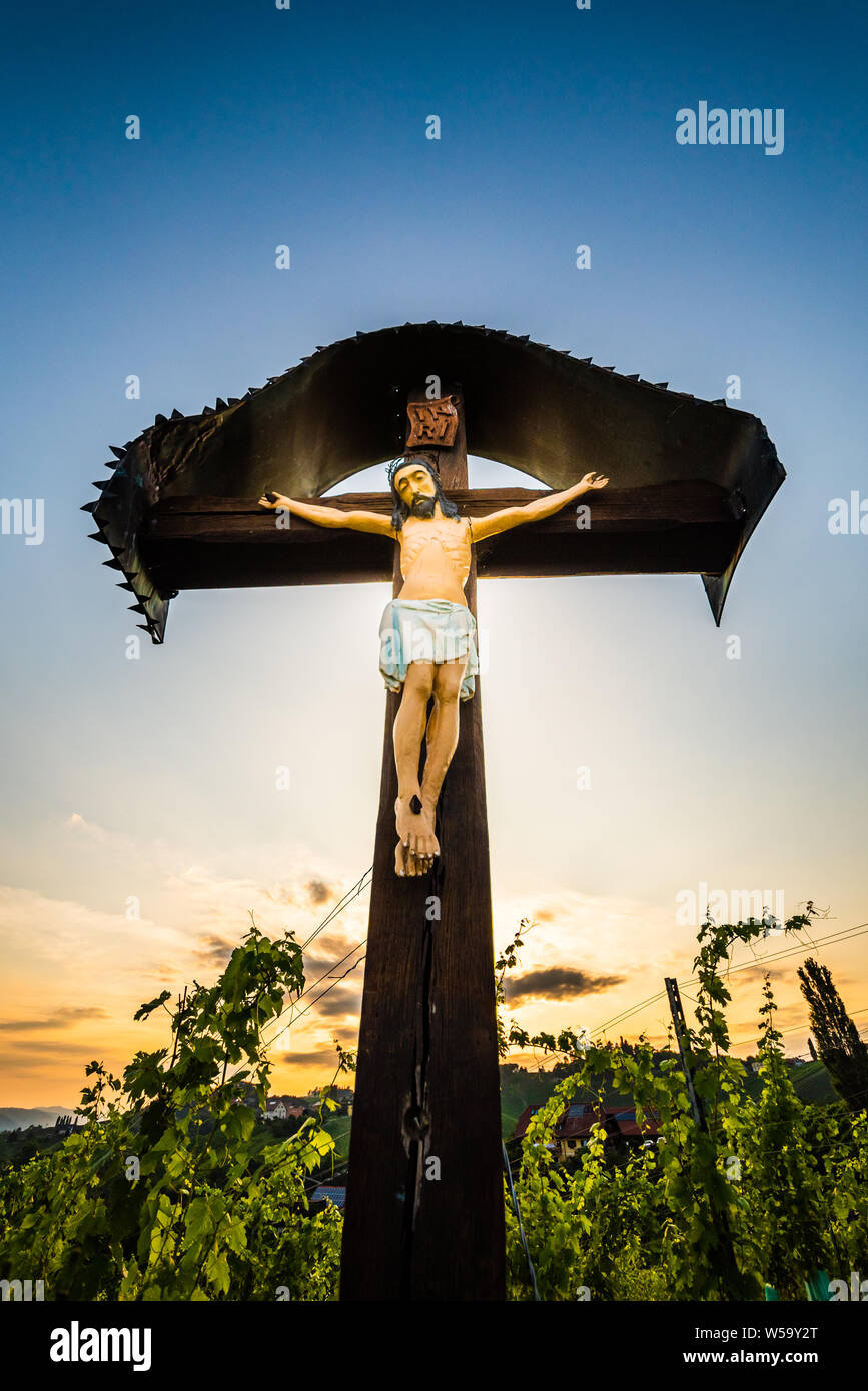 Christian wooden cross with figure of Jesus Christ on Vineyards at ...