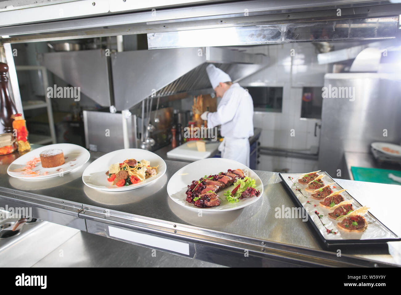 the distribution table in the kitchen of the restaurant. the chef ...