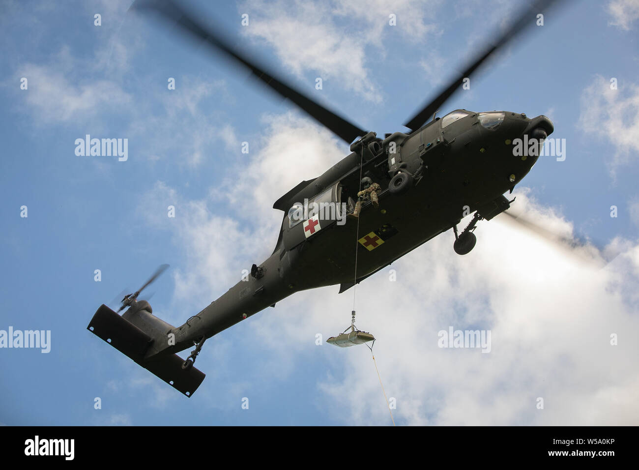 Helicopter hoist extraction hi-res stock photography and images - Alamy