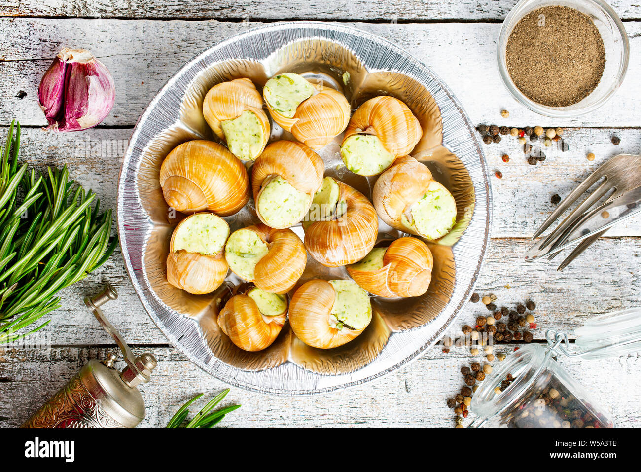 fried snails with garlic spice and butter Stock Photo - Alamy