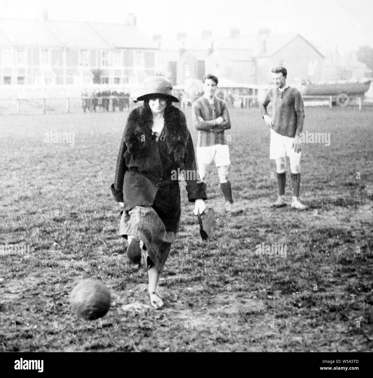 Woman playing football Stock Photo - Alamy