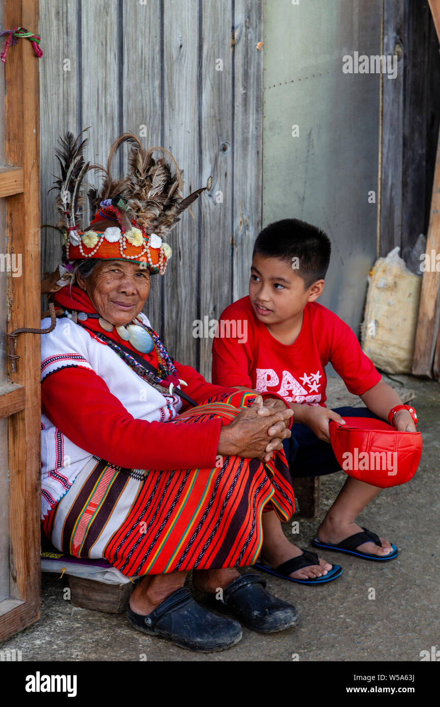 A Young Boy Is Fascinated By The Costume Worn By An Ifugao Tribal ...