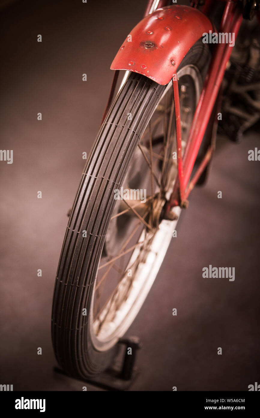 Color image of a vintage thin motorcycle wheel Stock Photo - Alamy