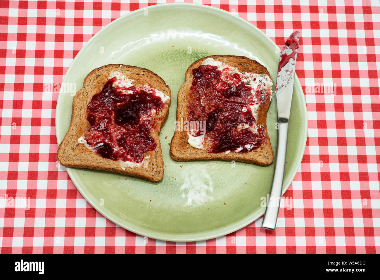 Wholemeal toast and raspberry jam hi-res stock photography and images ...