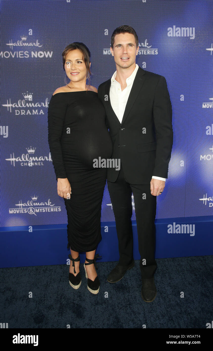 Beverly Hills, Ca. 26th July, 2019. Italia Ricci, Robbie Amell, at the ...