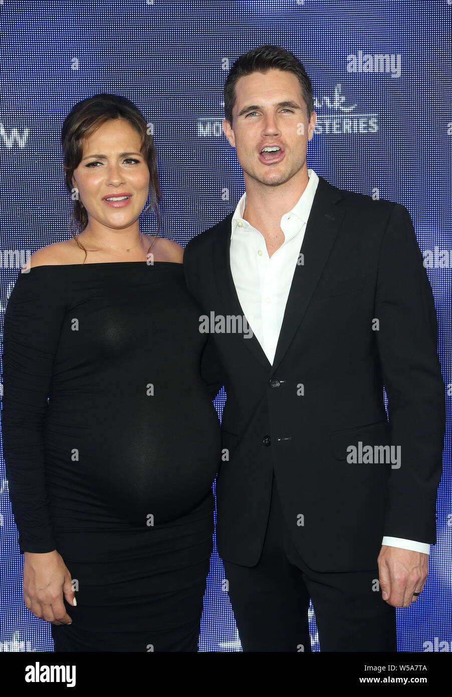 Beverly Hills, Ca. 26th July, 2019. Italia Ricci, Robbie Amell, at the ...