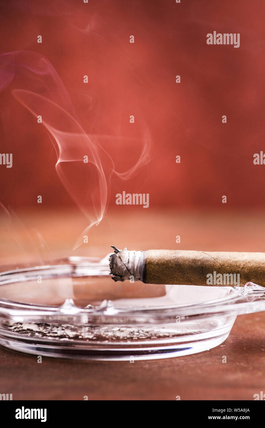 Lit cigar hi-res stock photography and images - Alamy