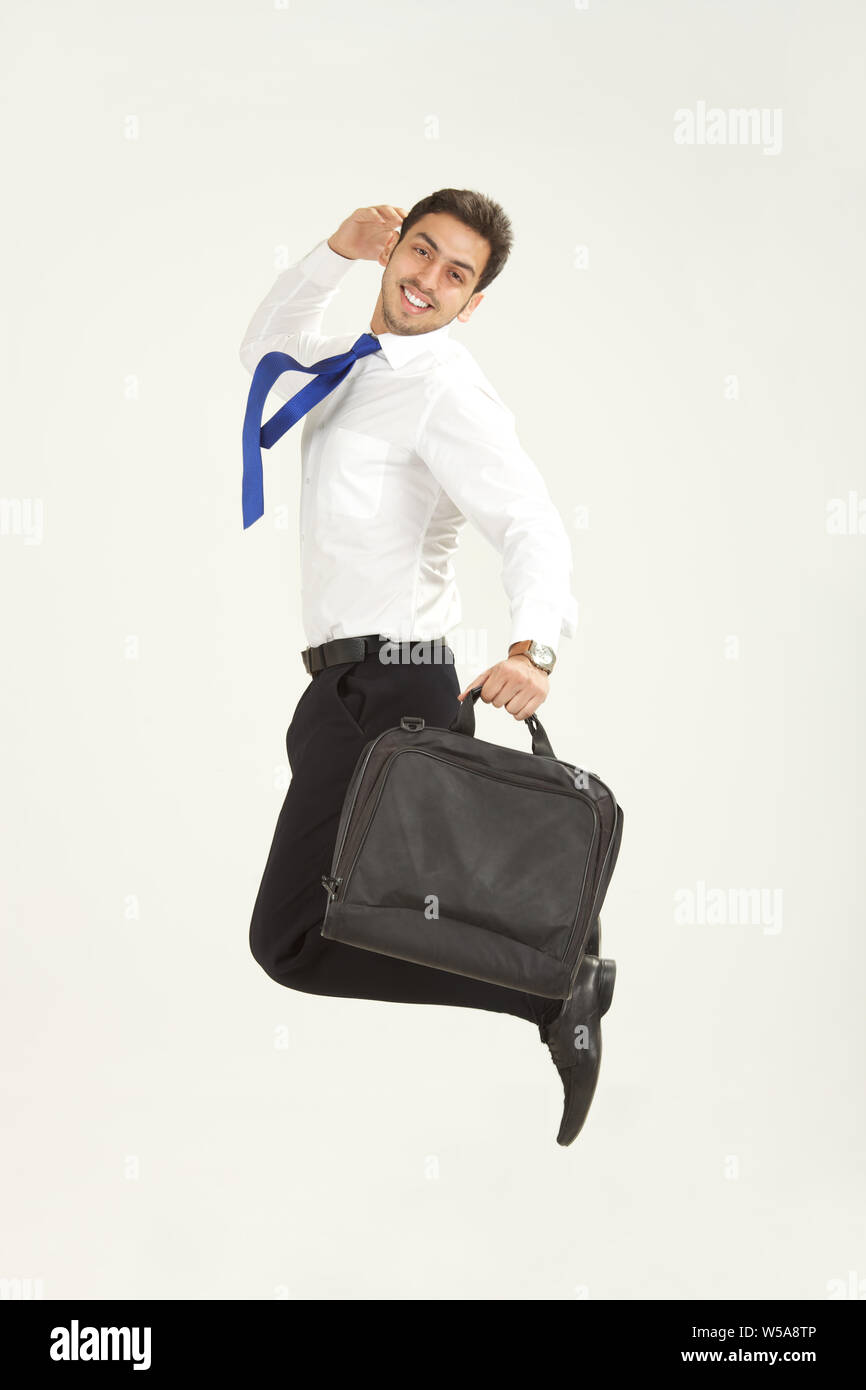 Office worker jumping hi-res stock photography and images - Alamy
