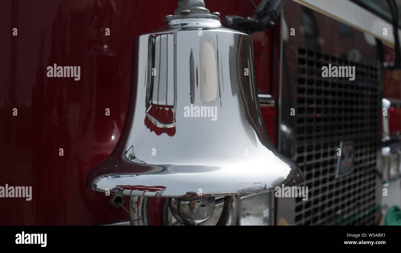 Silver bell is a part of an old fire truck. This historic fire truck is ...