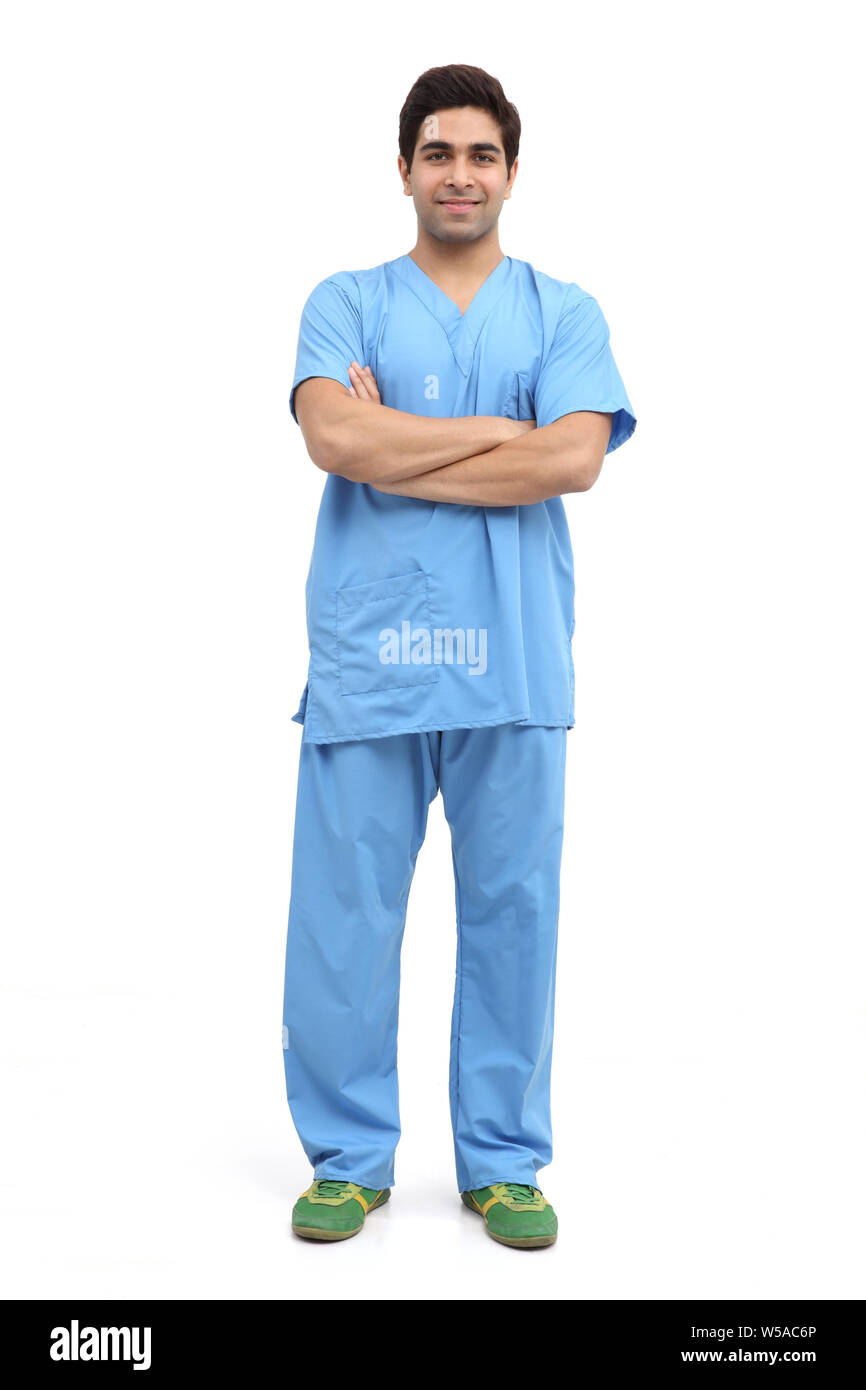 Patient standing with his arms crossed Stock Photo - Alamy