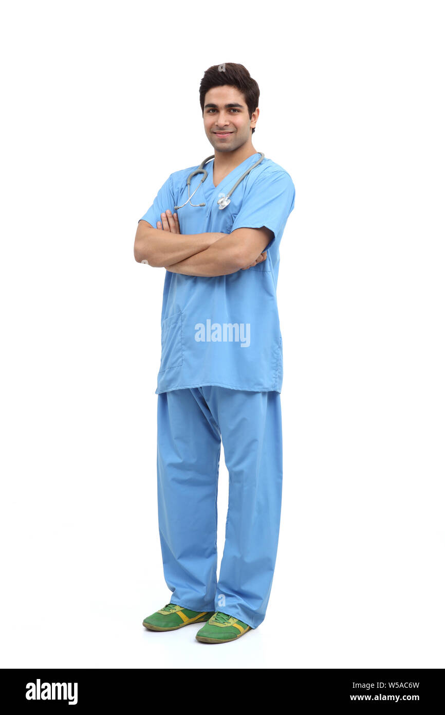 Surgeon standing with his arms crossed Stock Photo - Alamy