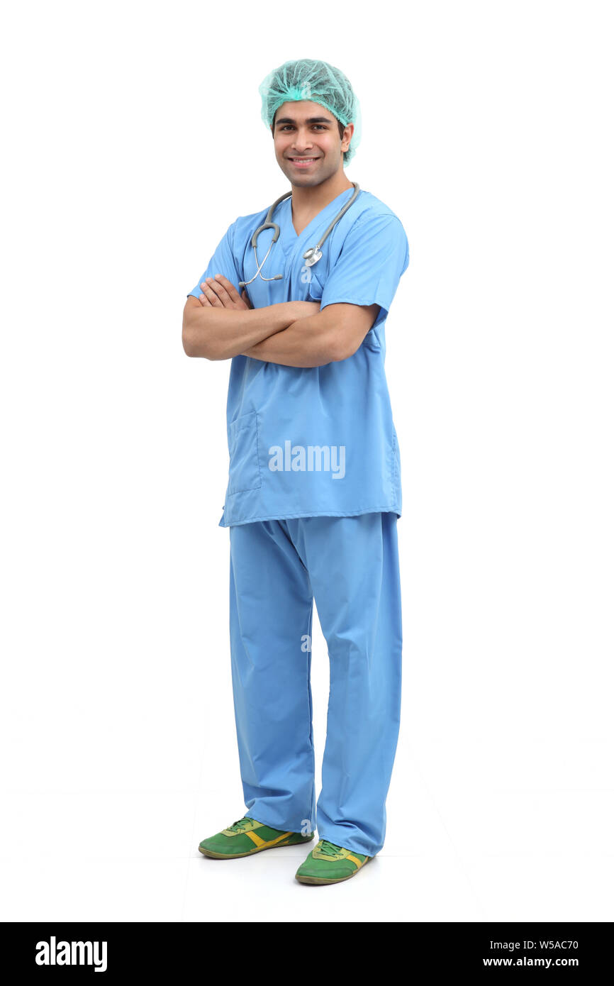 Surgeon standing with his arms crossed Stock Photo - Alamy