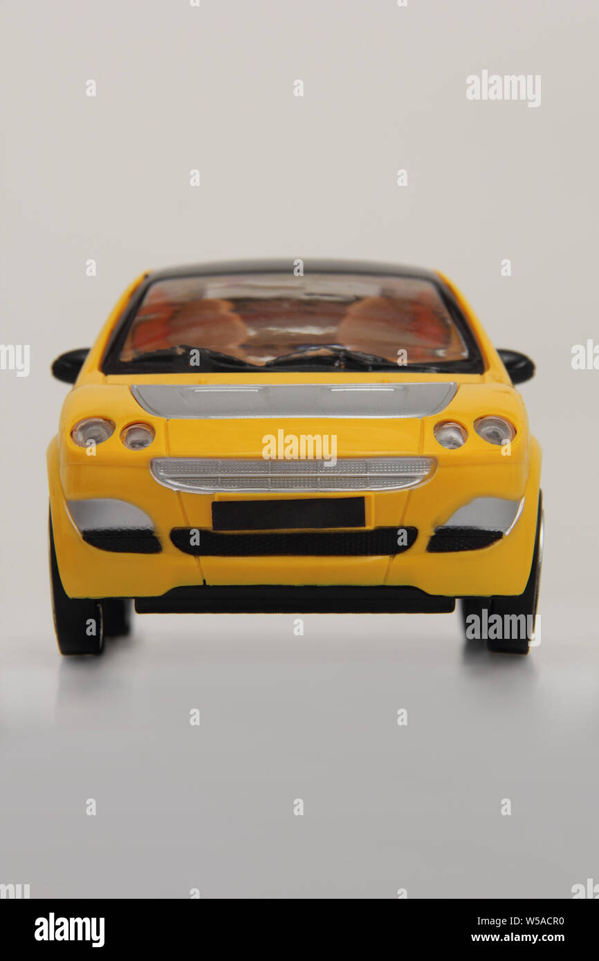 Plastic yellow car model hi-res stock photography and images - Alamy