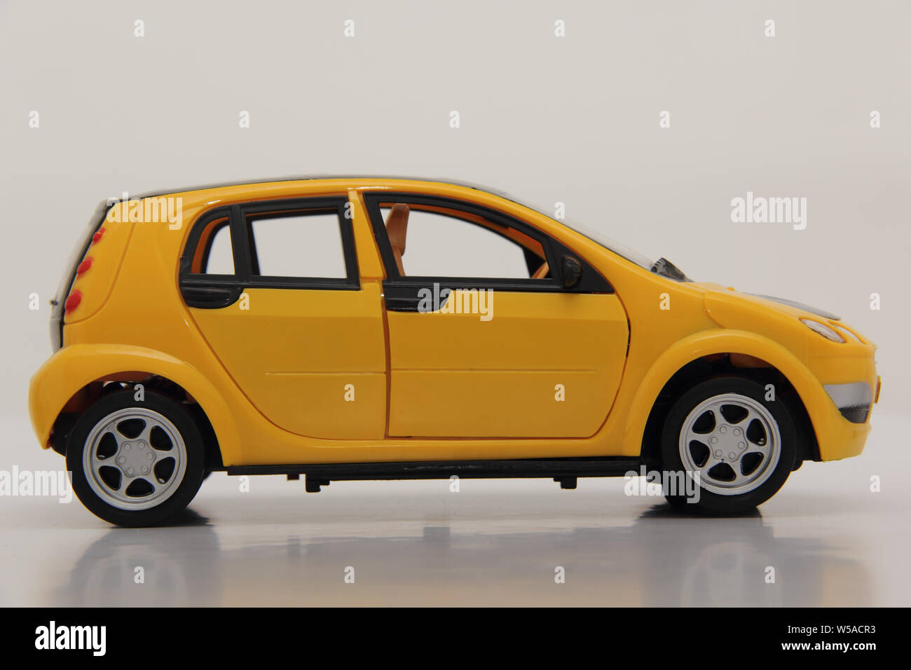 Plastic yellow car model hi-res stock photography and images - Alamy