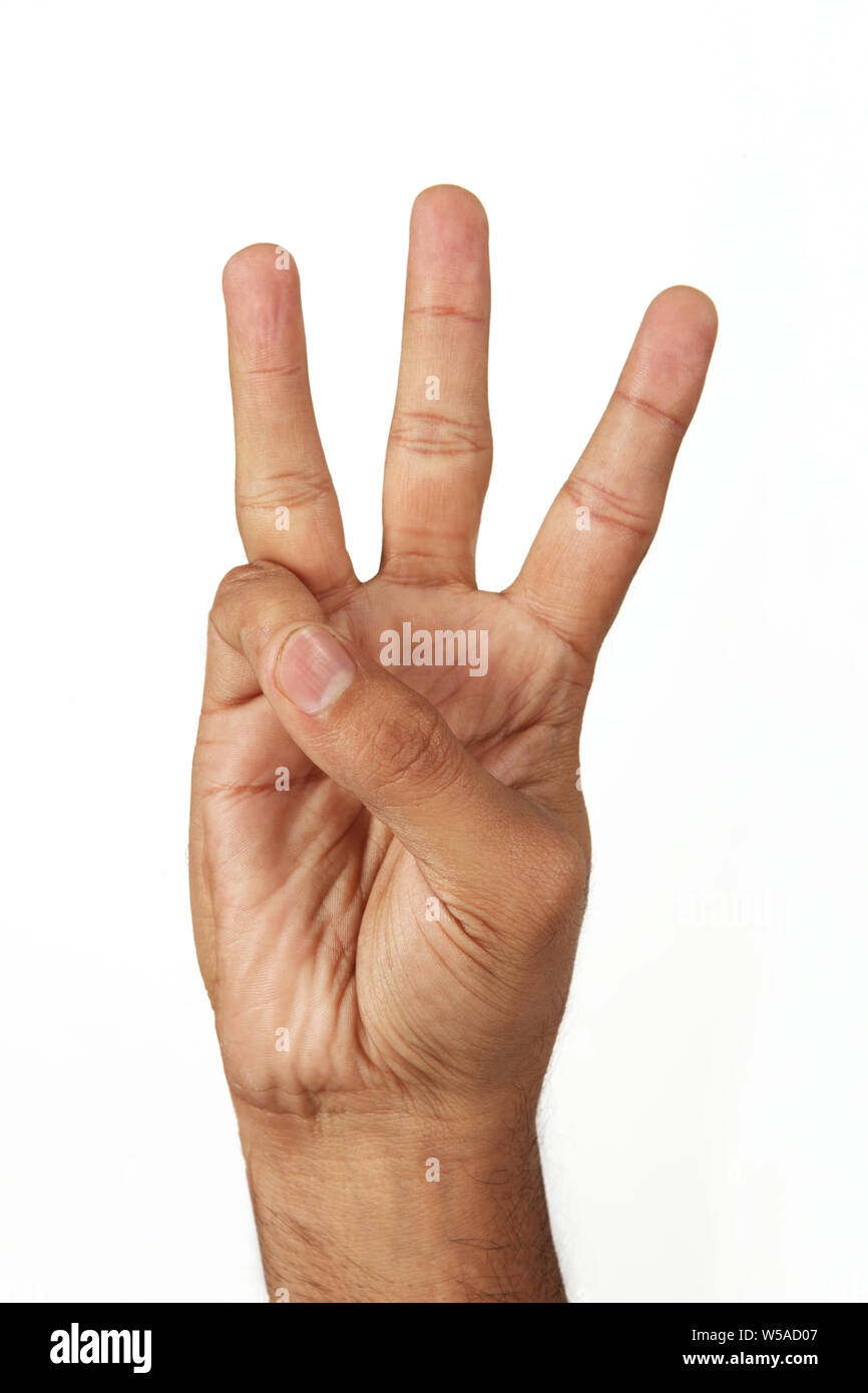 Person hand showing three fingers Stock Photo - Alamy