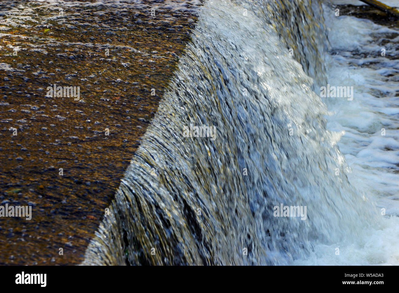 Small waterfall in the brook Stock Photo - Alamy