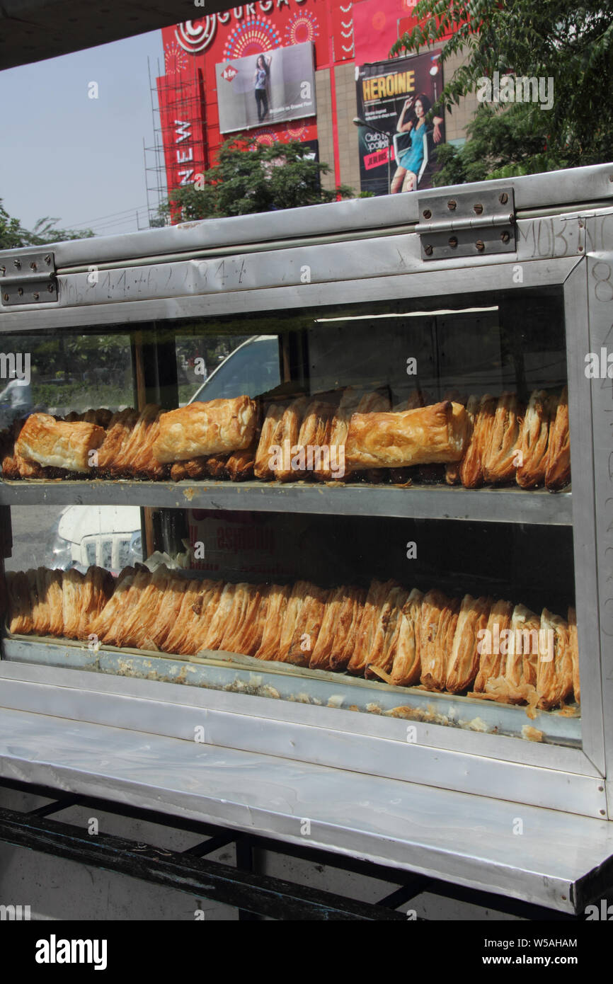 Indian snack food at a food stall Stock Photo - Alamy
