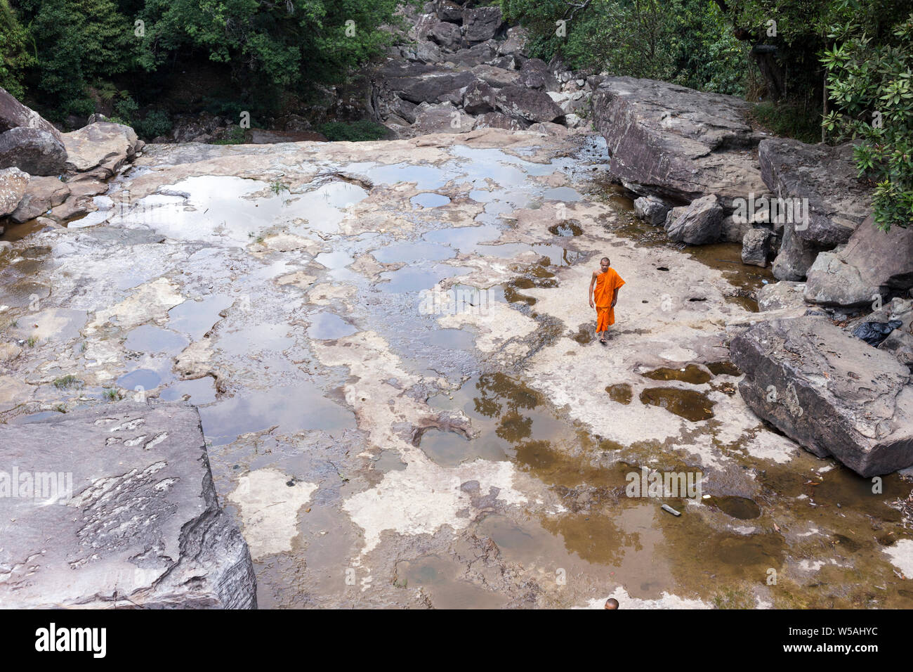 Popokvil Waterfall, Kep, Cambodia - April 27, 2014: Monk visiting Kep ...
