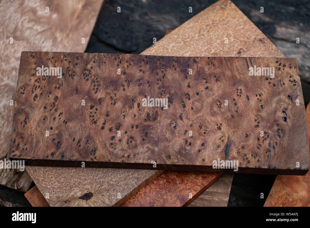 Sawed timber burl wood striped prepare for the crafts Stock Photo - Alamy