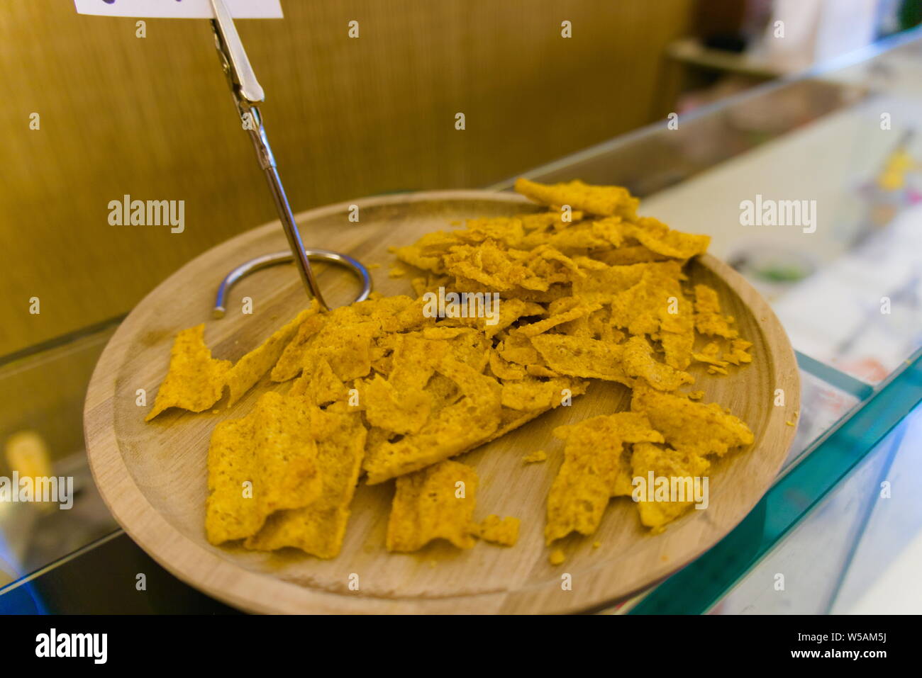 tasting dish in the restaurant with organic whole grain chips Stock ...