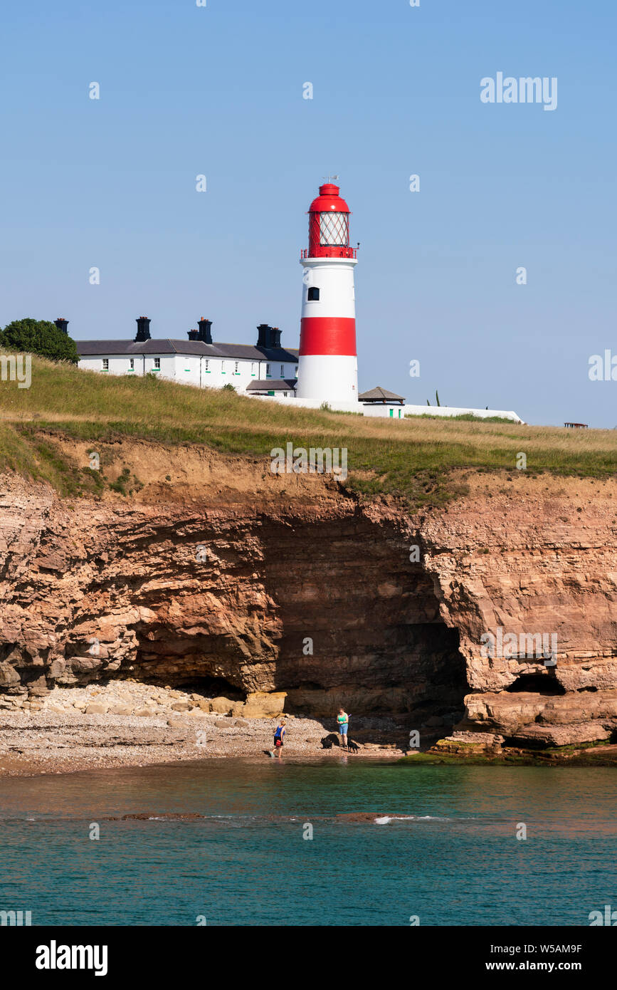 The beach and cave in cliffs at Byer's Hole / The Wherry with Souter ...