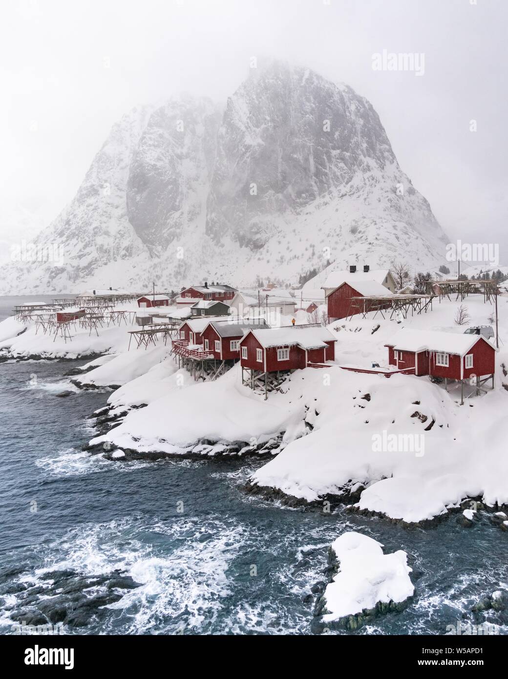 Snowstorm, red stilt houses, Hamnoy, drone shot, Lofoten, Norway Stock ...
