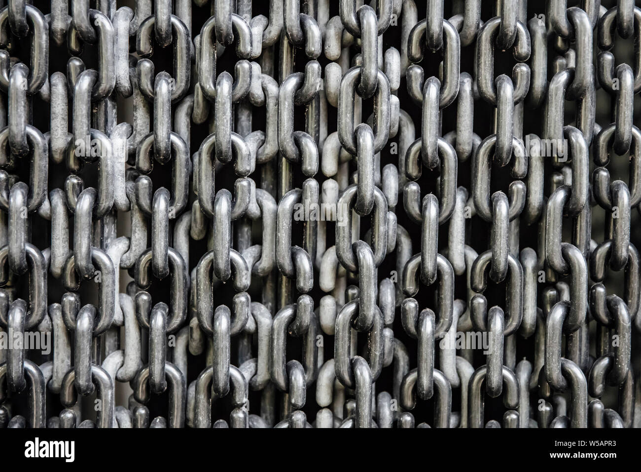 Closeup detail of the metal chains background Stock Photo - Alamy