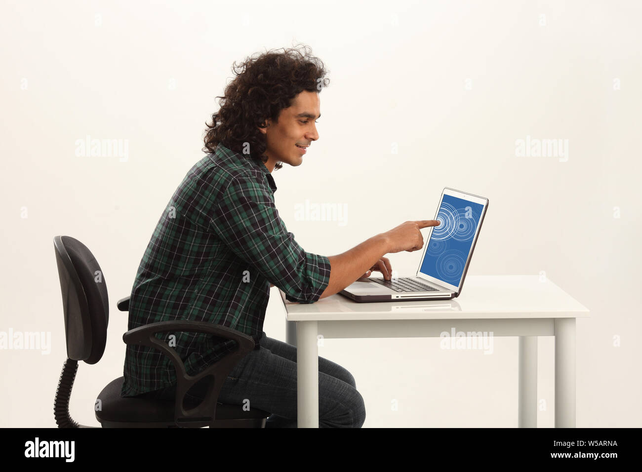 Curly indian man pointing hi-res stock photography and images - Alamy