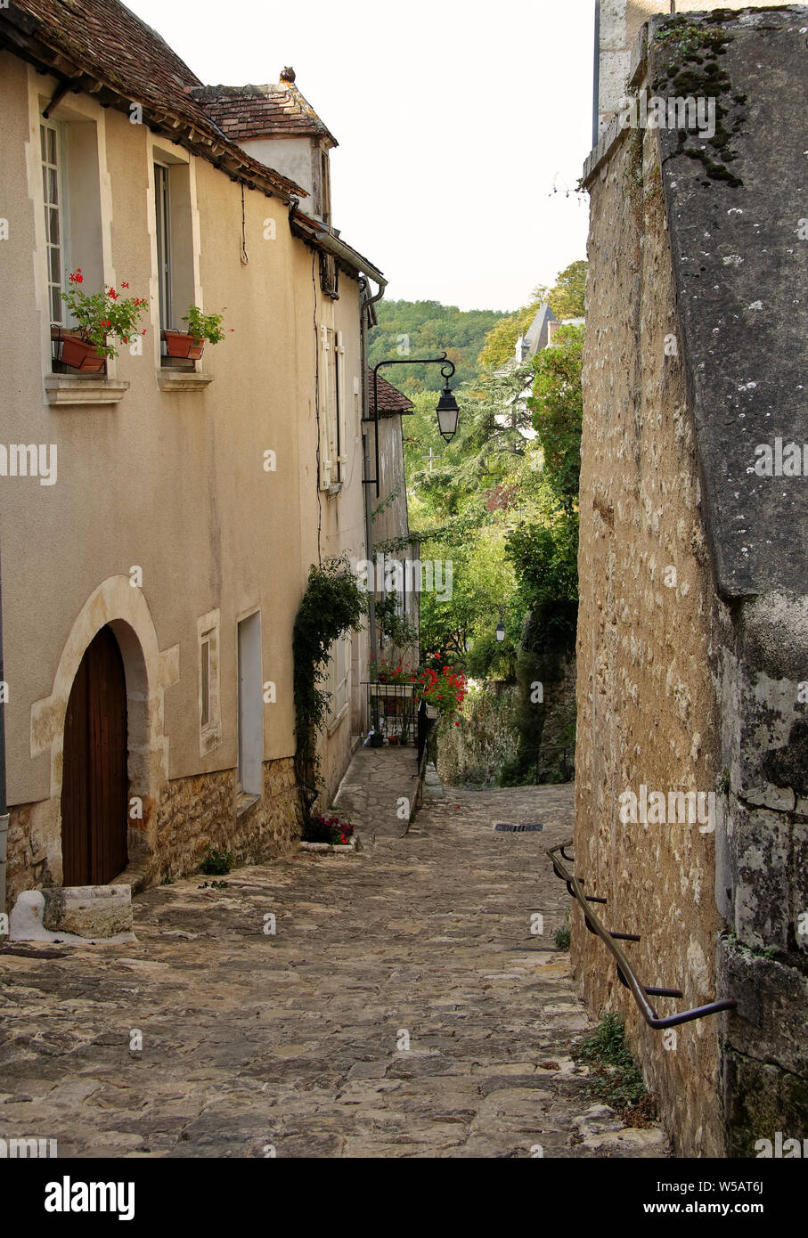 Rustic narrow Street in a rural village in Limousin in France Stock ...