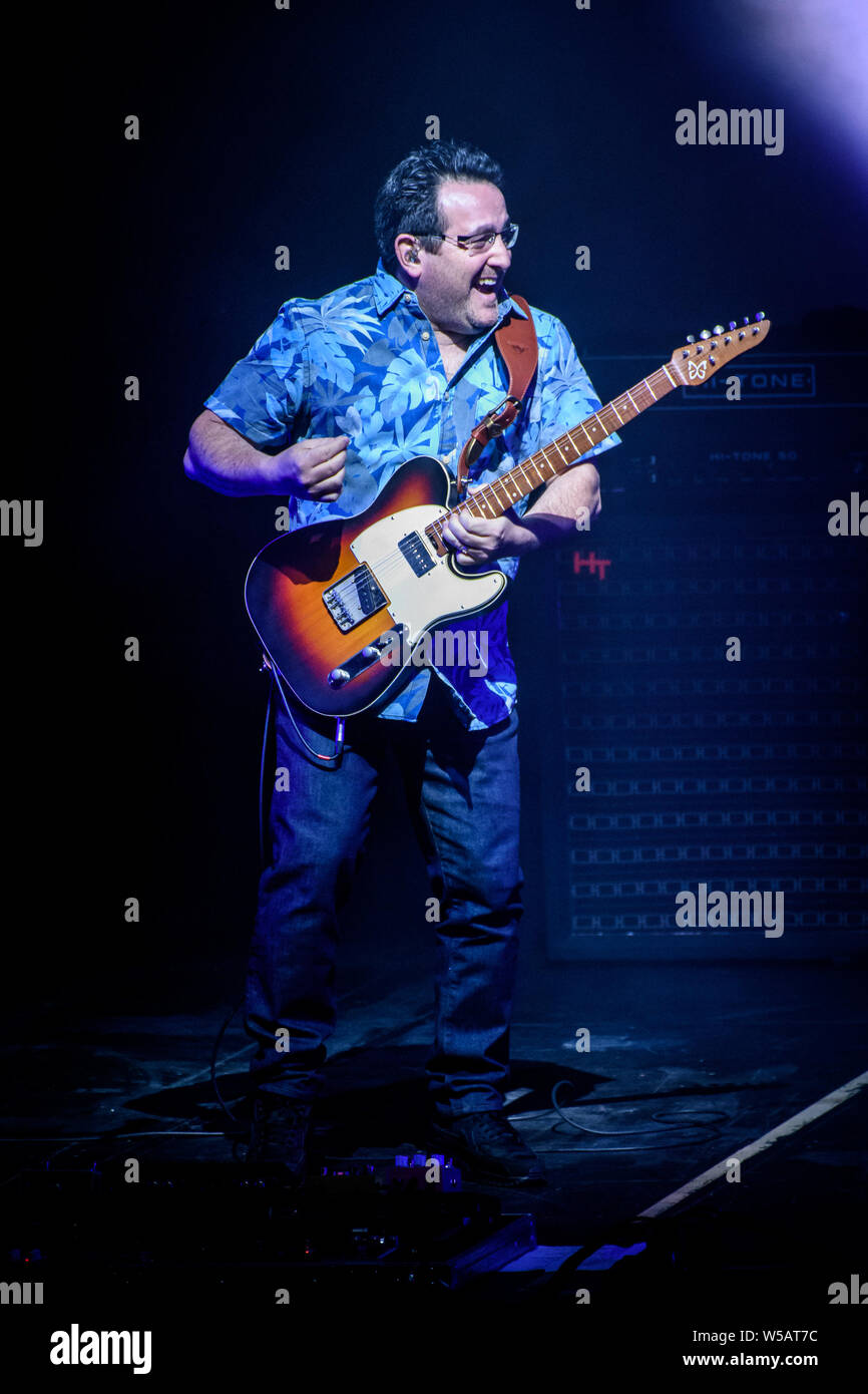 Lee Harris a former guitarist of 'The Blockheads' playing with the Nick ...