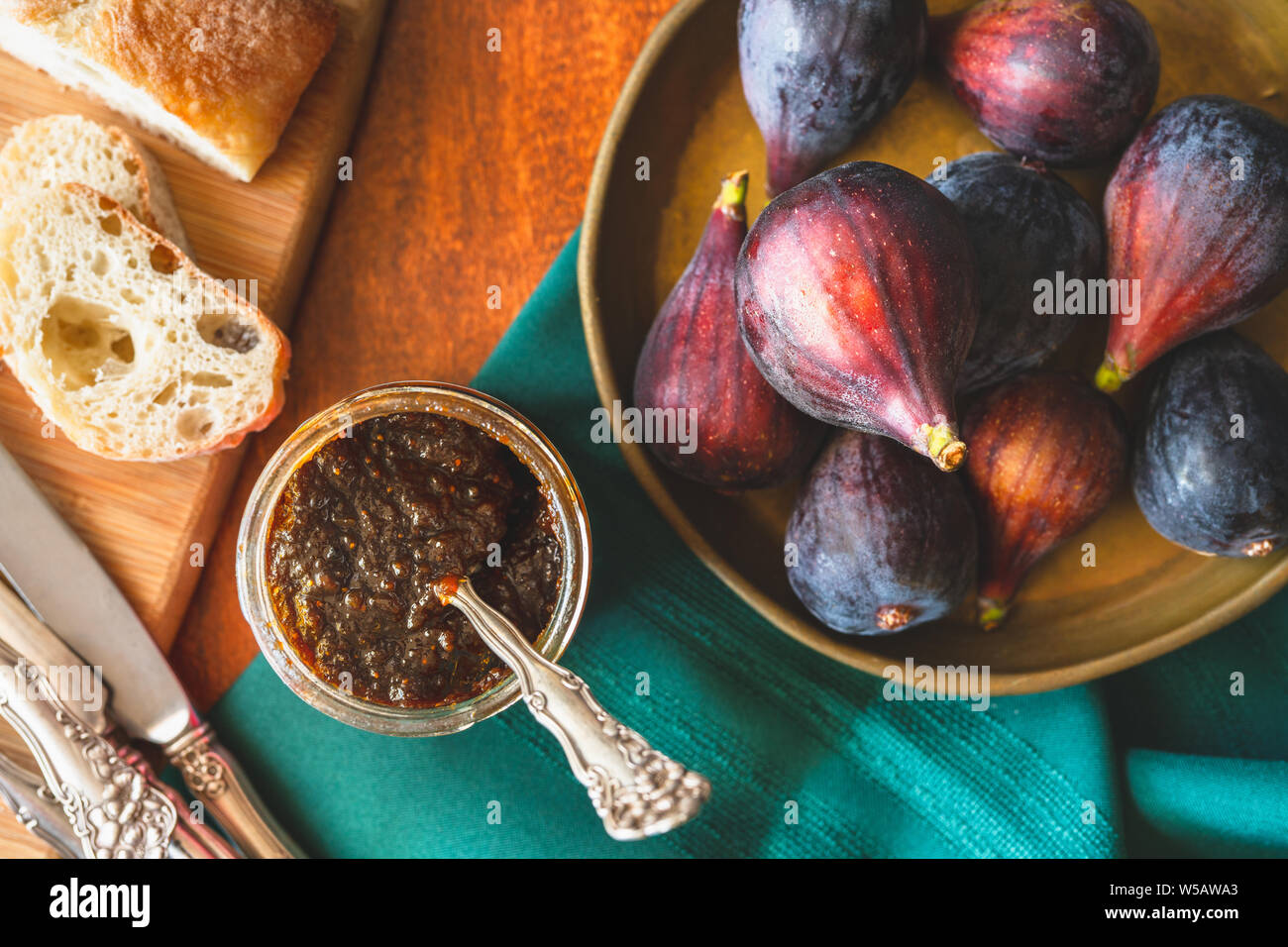 Fig Jam in a Glass Jar, and Fresh Figs, Top View on a Wooden Kitchen ...