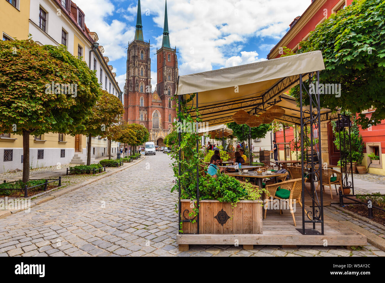 WROCLAW, POLAND - July 17, 2019: Katedralna Street, the main street of Ostrow Tumski, one of the ...