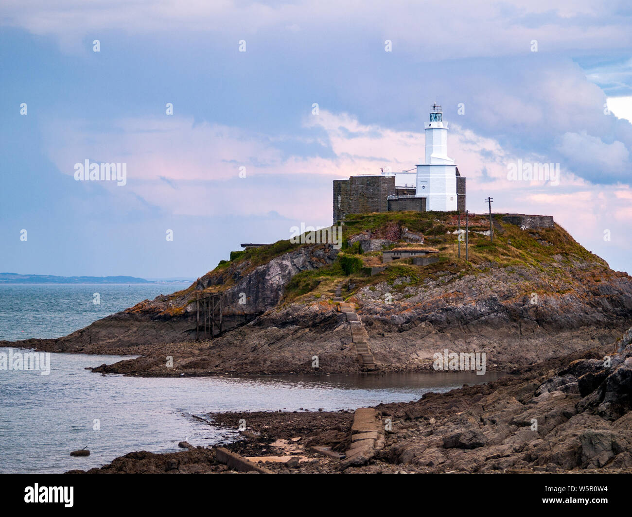 Mumbles lighthouse on Mumbles Head, Swansea Bay, Swansea, Wales, UK ...
