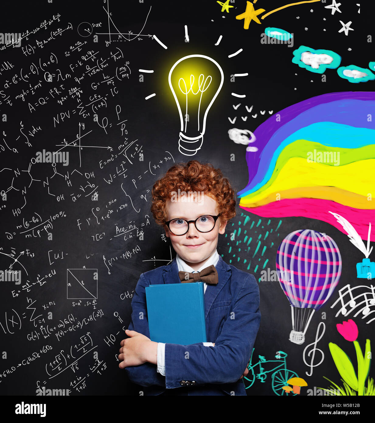 Kid with lightbulb on blackboard background, idea concept Stock Photo ...