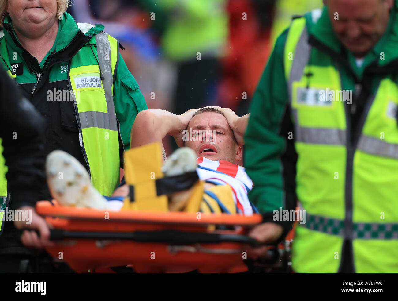 Injured Stretchered Football High Resolution Stock Photography and ...