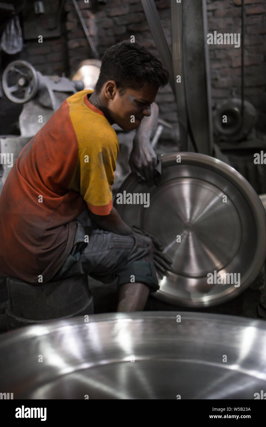 Child labour pot boy hi-res stock photography and images - Alamy